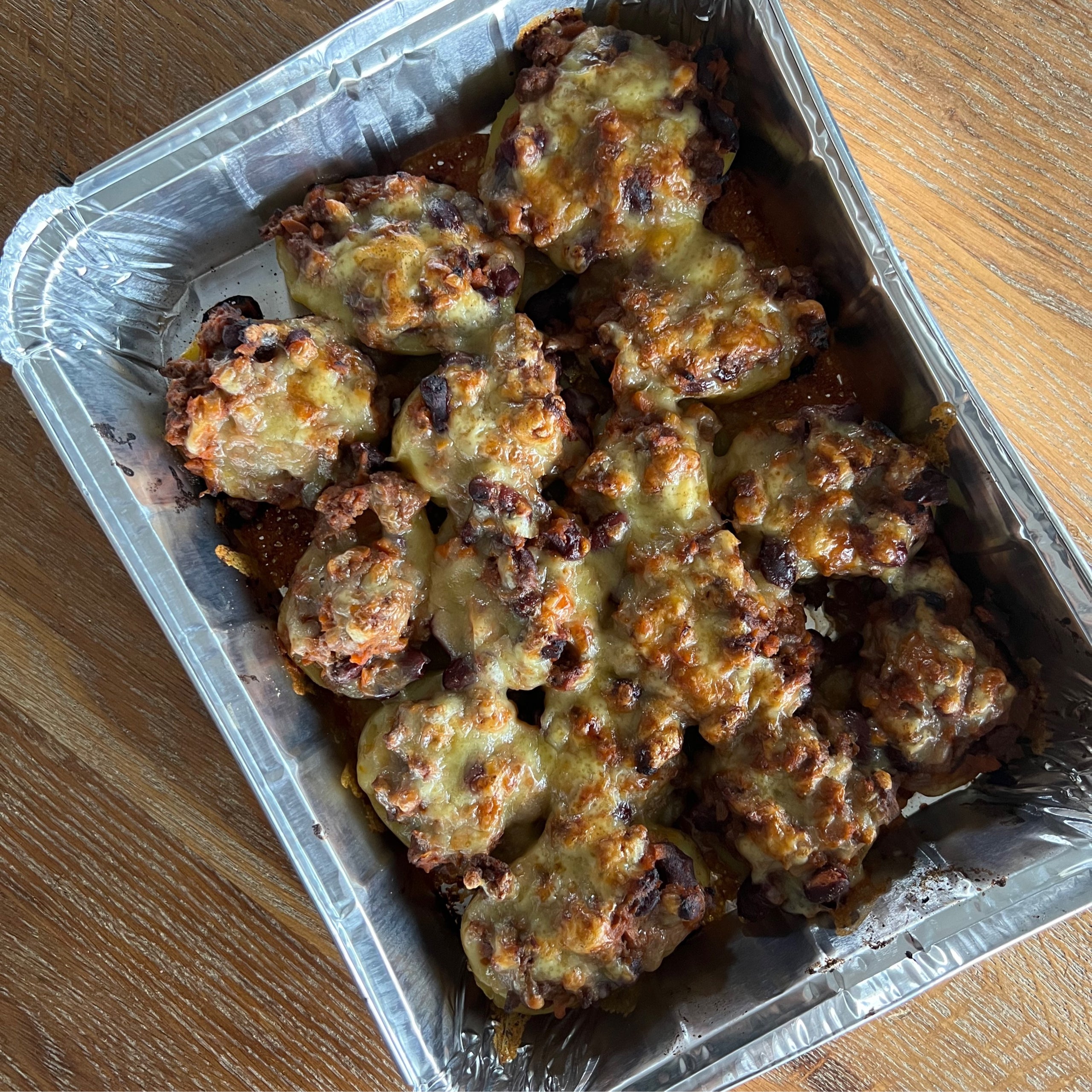 Jacket Potatoes Stuffed with Bean Filling Served With a Side Salad ...